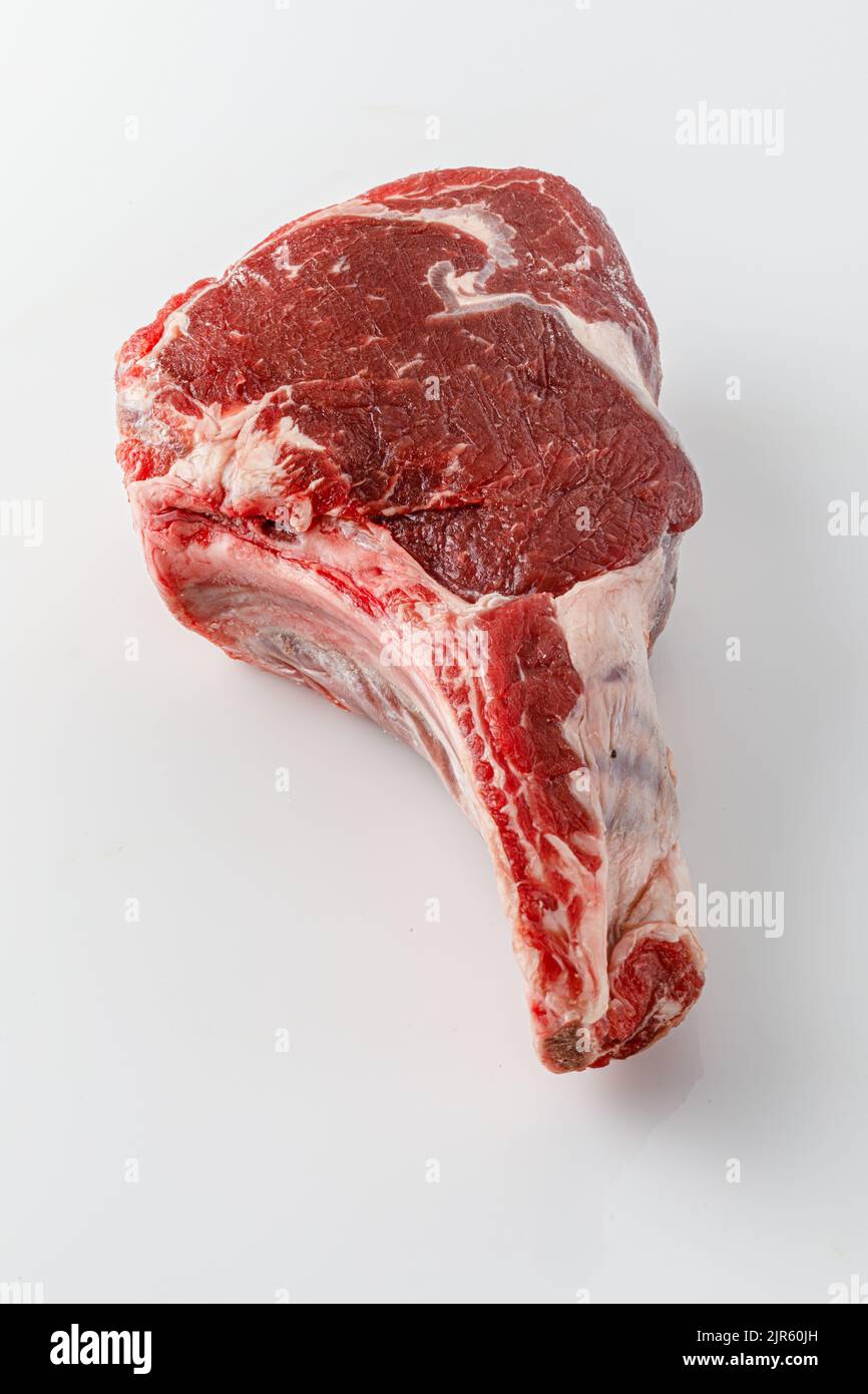 Tomahawk steak. Raw bone-steak top view Stock Photo - Alamy