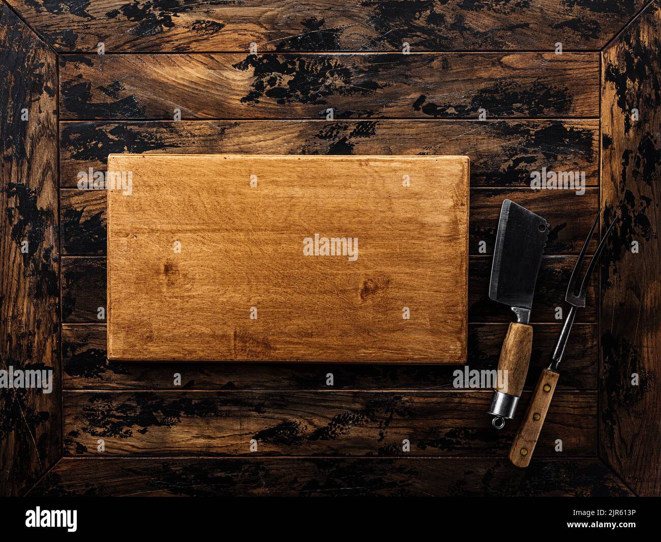 Rustic kitchen background. Wooden chopping board and vintage knife ...