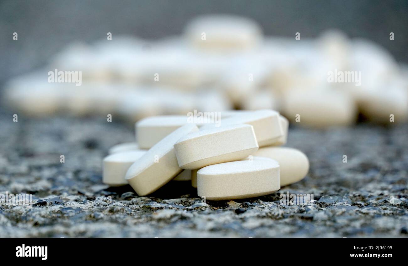 Expired medicine, healthcare concept. prescription drugs on a concrete ...