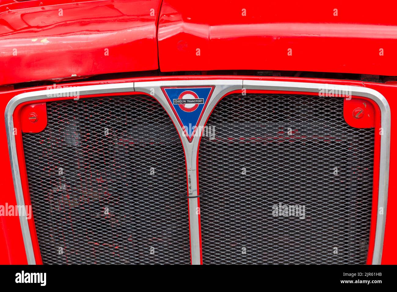 Close up detail of London Transport badge logo on front of vintage red ...