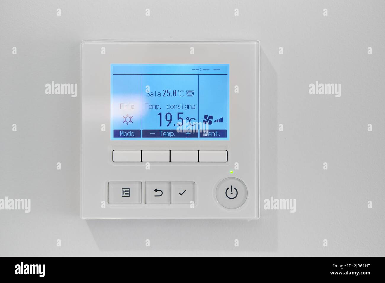 Close up shot mounted on white wall, climate control show 19,5 degrees ...