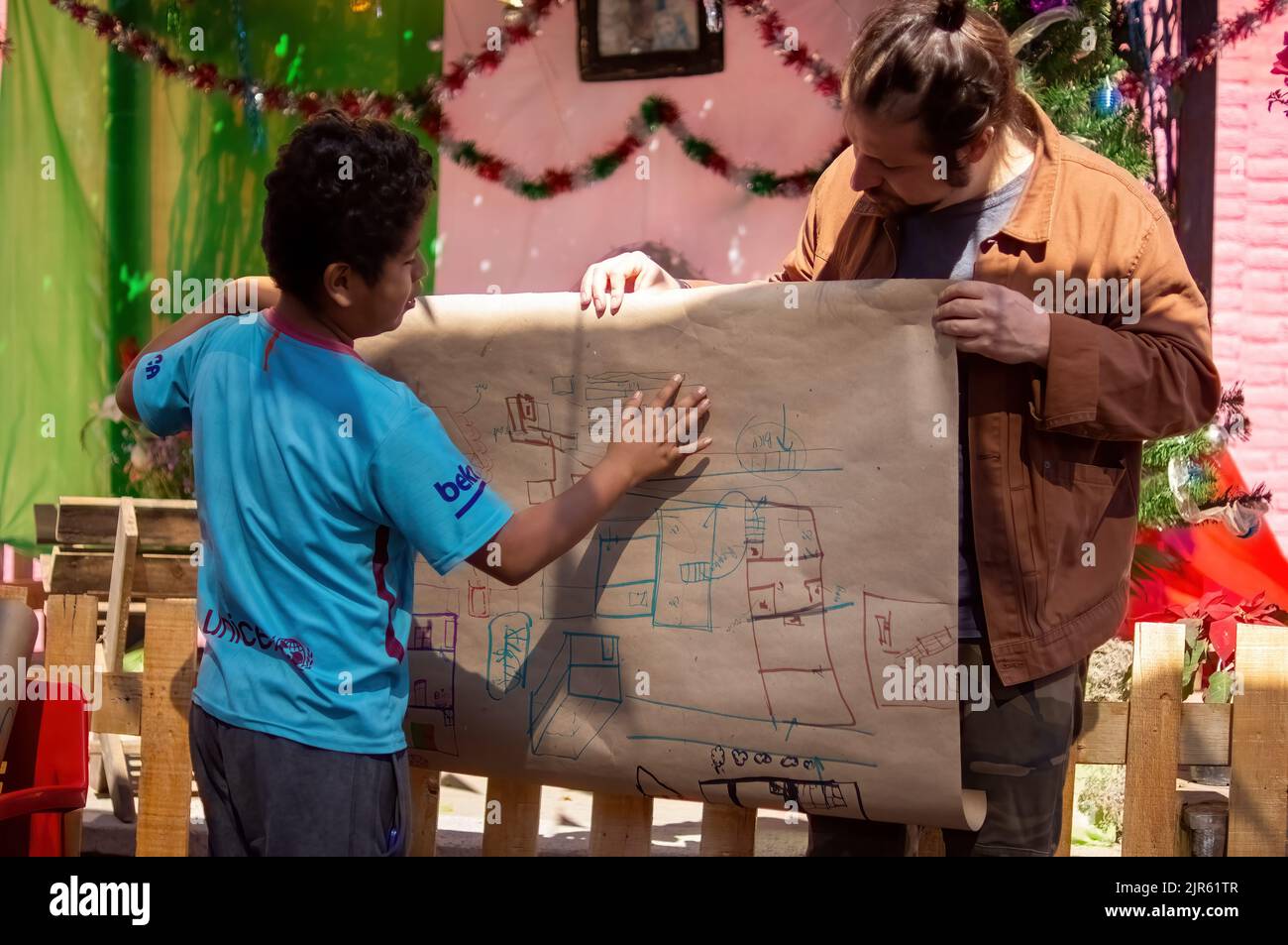 person drawing by hand with pen, pencil and ink, architectural ...