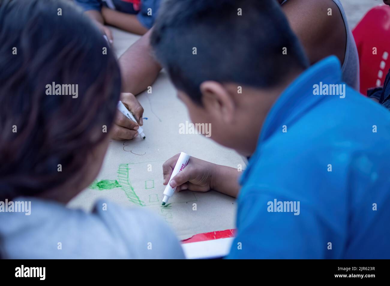 person drawing by hand with pen, pencil and ink, architectural ...