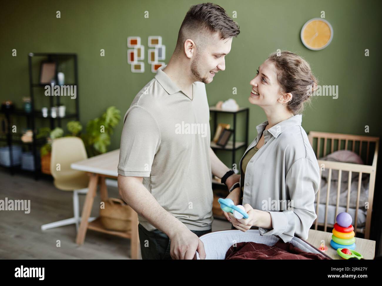 Man babysitting young girl hi-res stock photography and images - Alamy