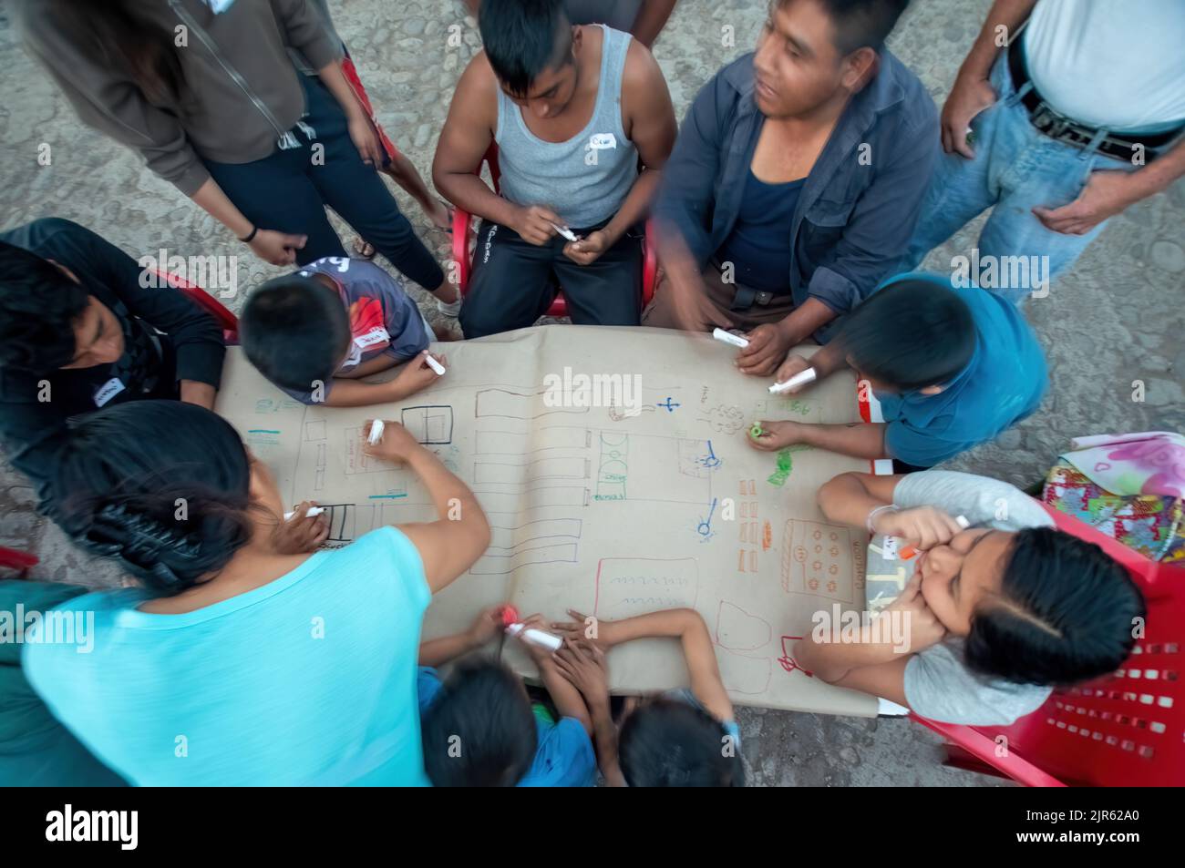 person drawing by hand with pen, pencil and ink, architectural ...