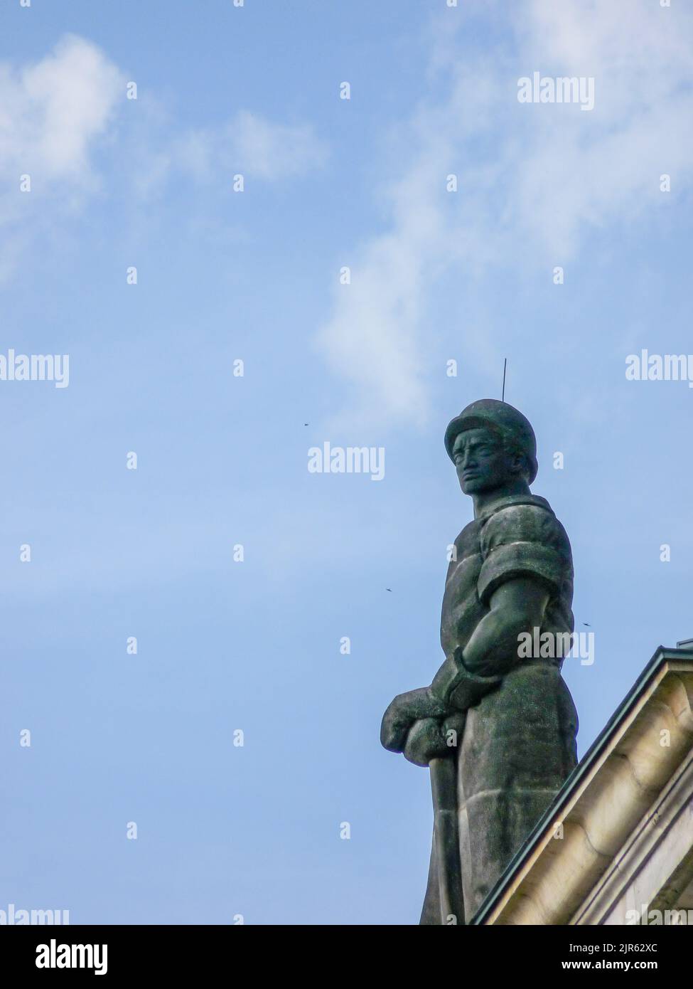 A low angle of a statue in Berlin, Germany with a clear sy background ...