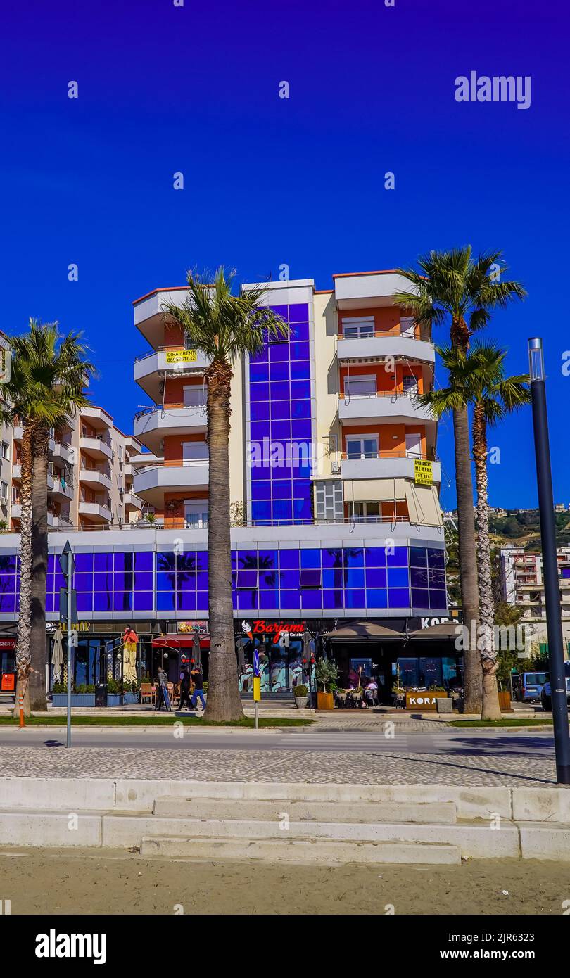 A vertical shot of buildings on the main beach in the Albanian resort ...