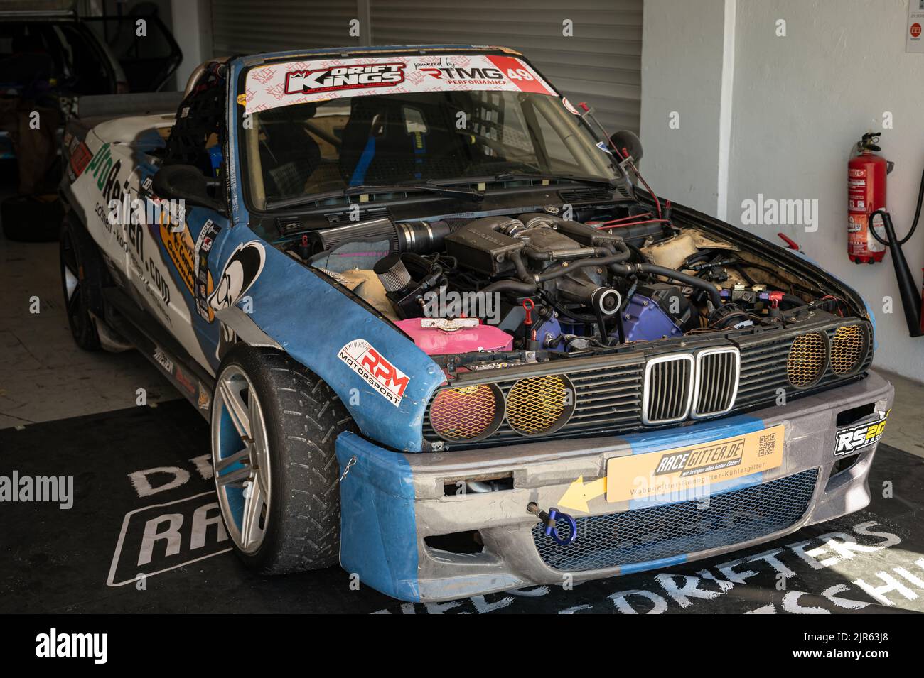 The details of the engine of a BMW E30 pickup prepared for drift racing ...