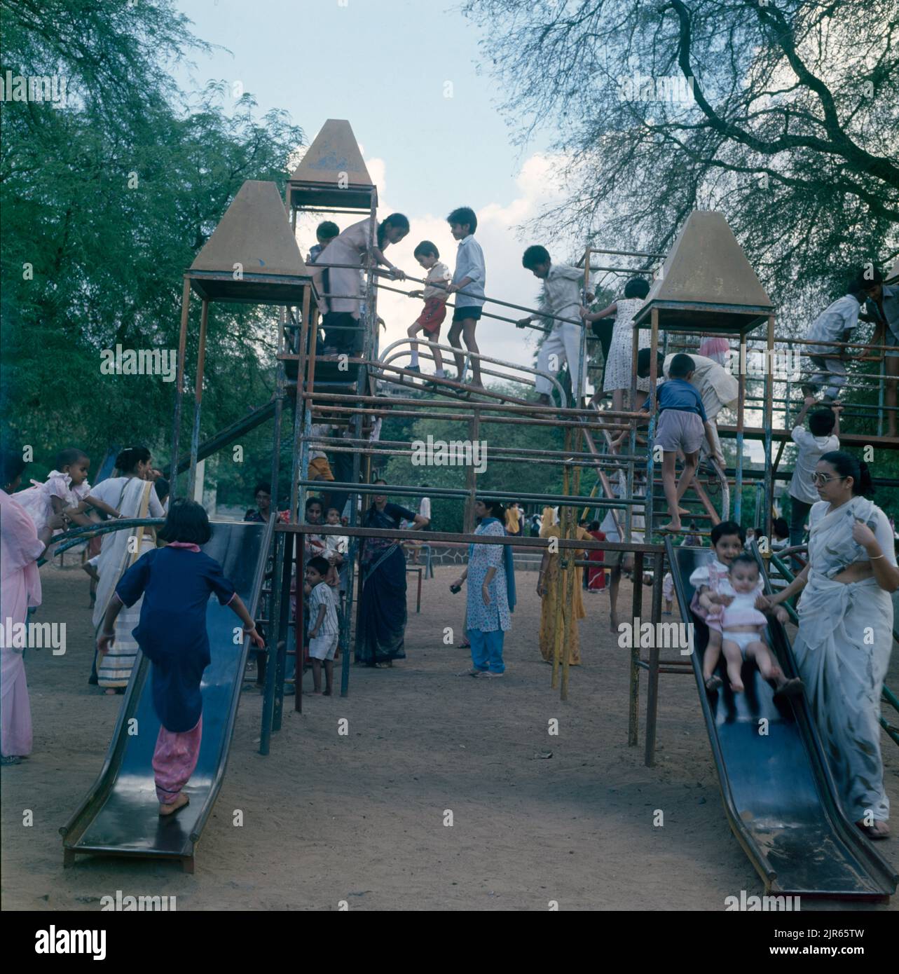 Indian children playing in trees hi-res stock photography and images ...