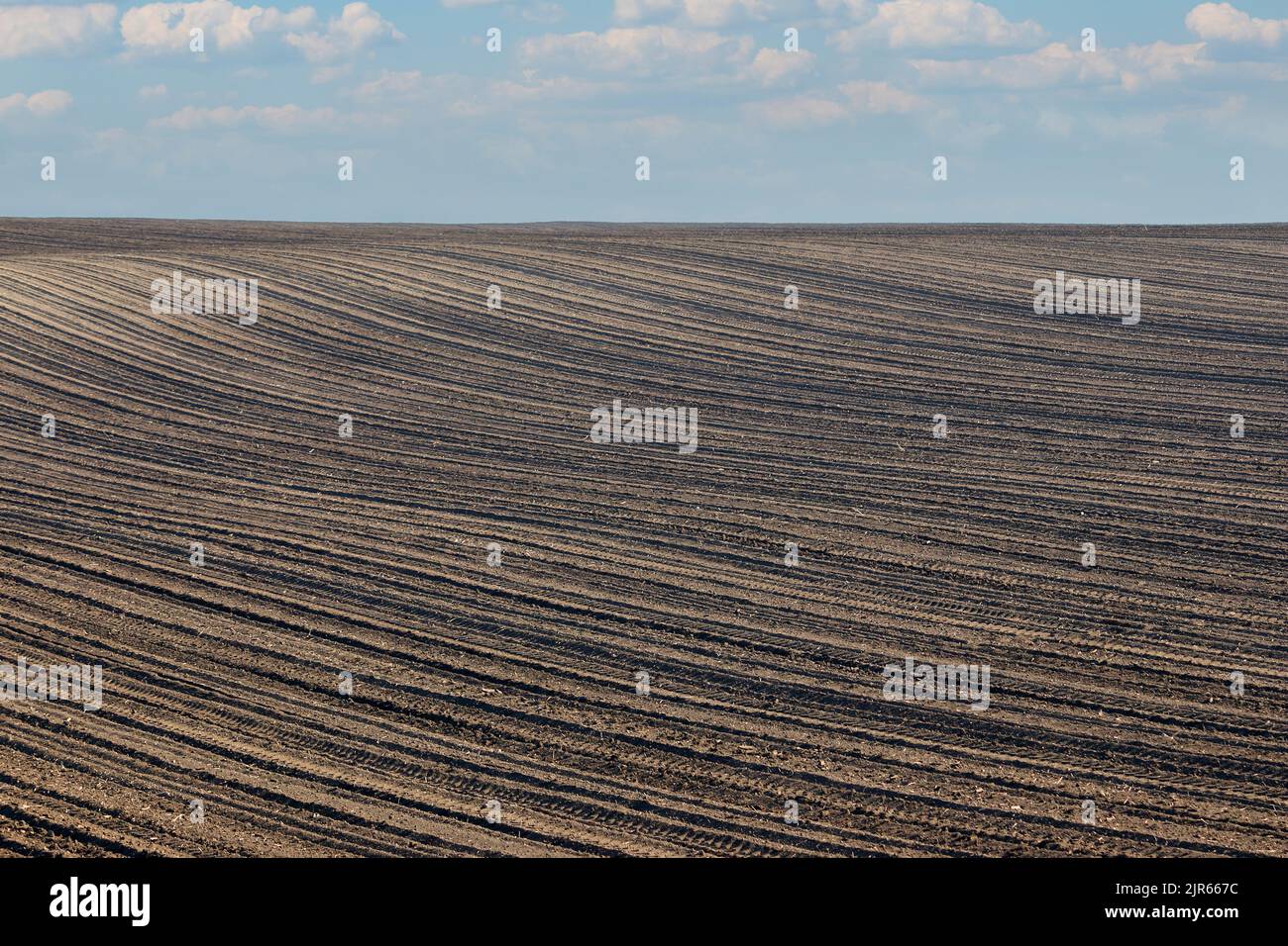 agriculture plowed field landscape nature background Stock Photo - Alamy