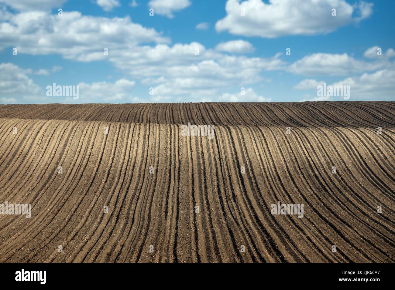 plowed field landscape agriculture nature background Stock Photo - Alamy