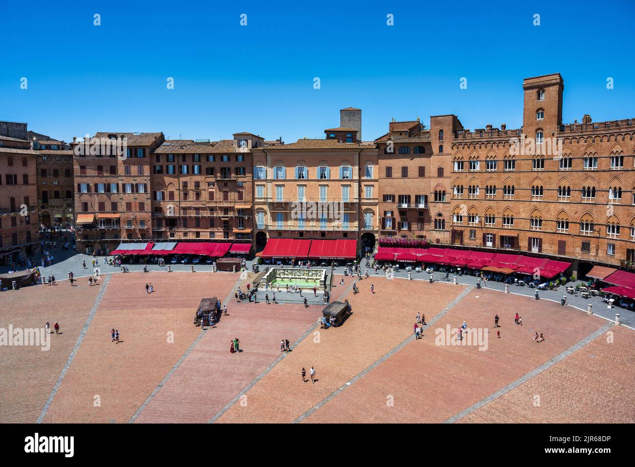 Elevated view of the medieval buildings surrounding Piazza del Campo in ...