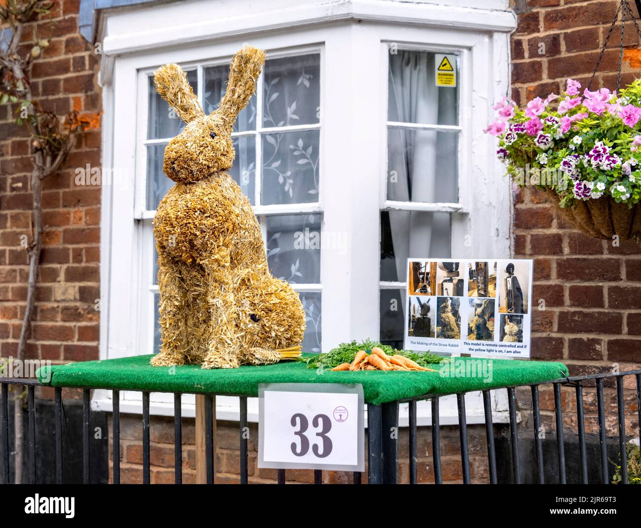 Flamstead Scarecrow Festival 2022 - Straw Rabbit sitting on wrought ...