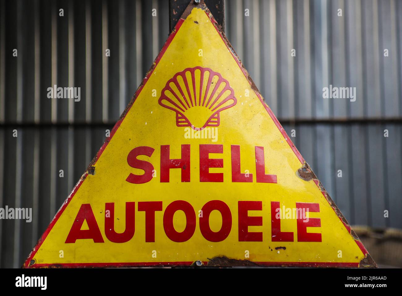 Old rusty vintage enamel Shell motor oil plaque Stock Photo - Alamy