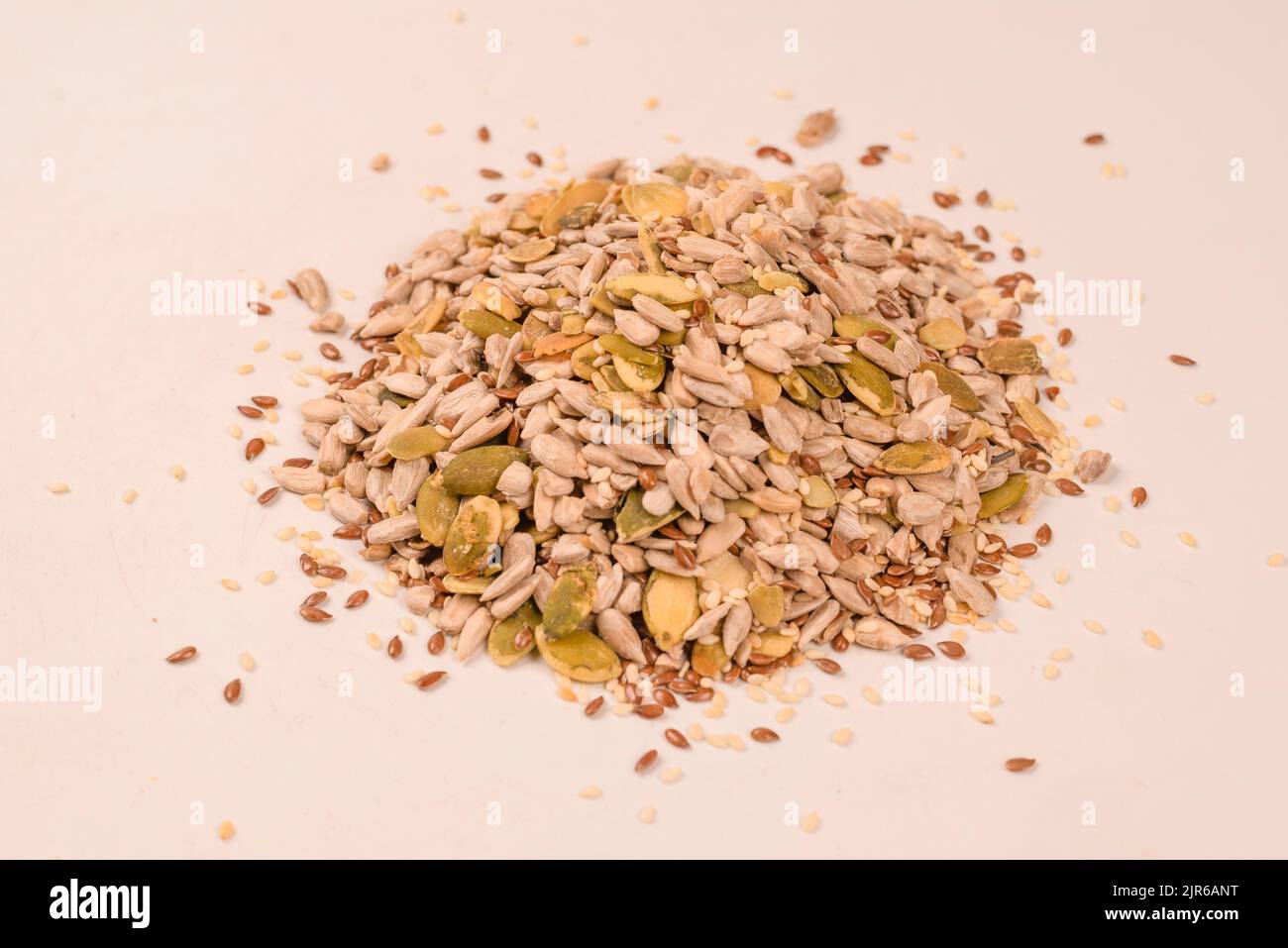 Mixed seeds pile isolated sunflower hi-res stock photography and images ...