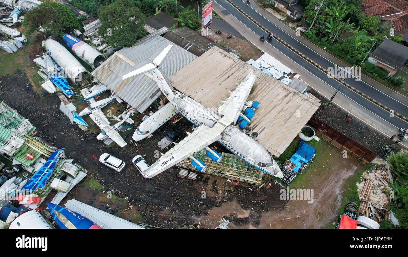 The wreckage of a tourist plane, in Parung, Bogor. The metal remains of ...