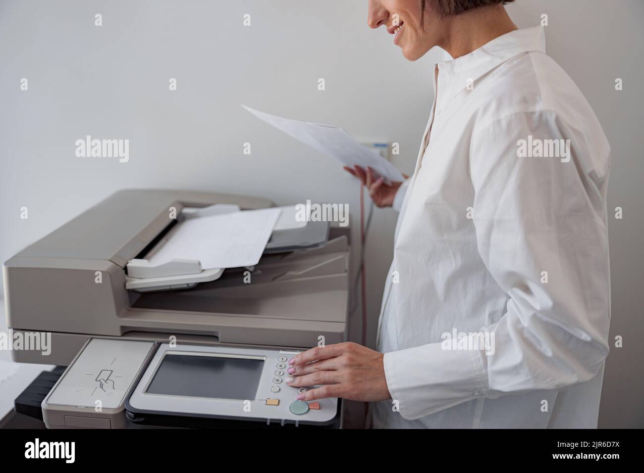 Woman photocopy machine hi-res stock photography and images - Alamy