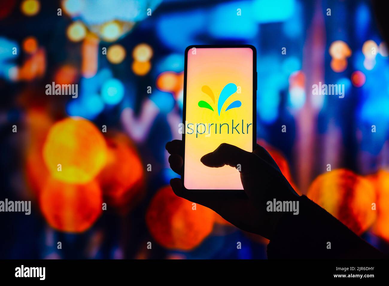 In this photo illustration, the Sprinklr logo is displayed on a ...
