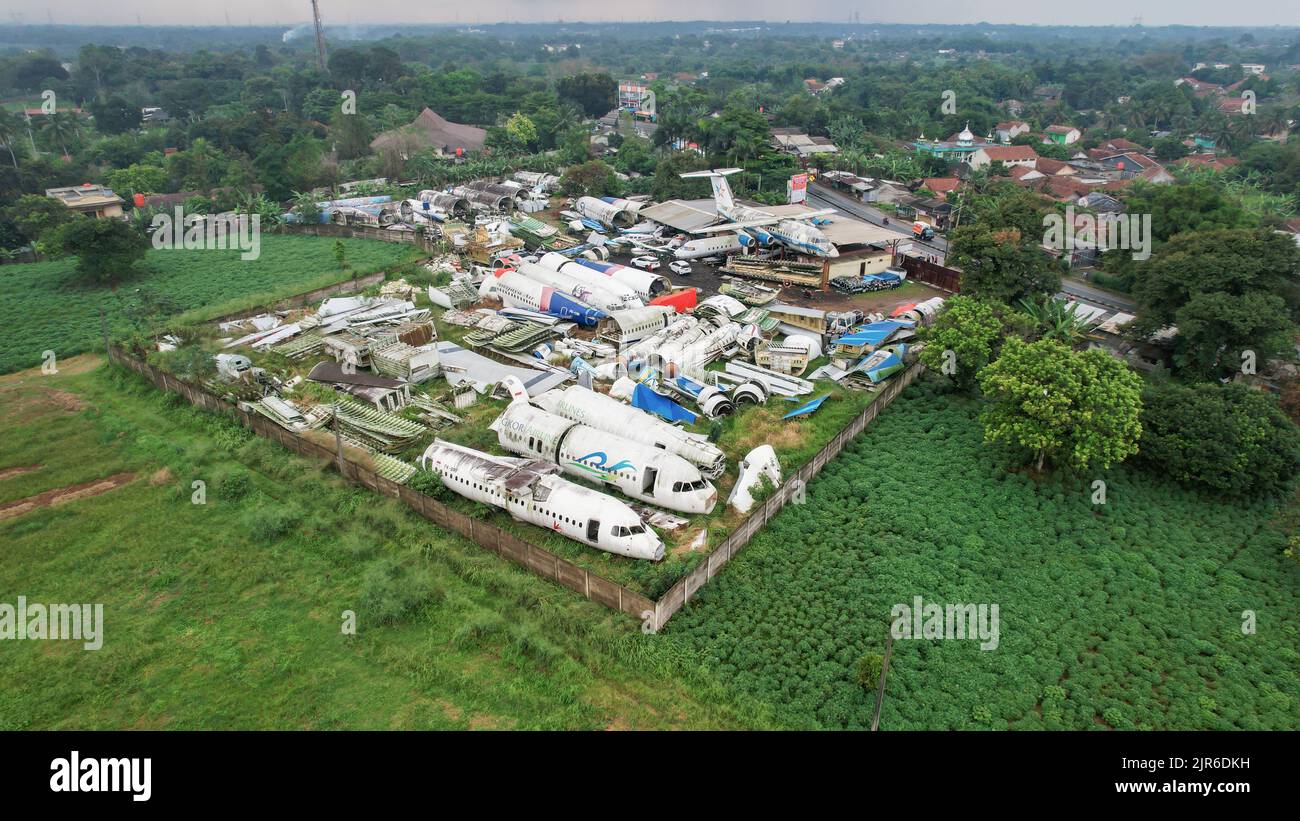 The wreckage of a tourist plane, in Parung, Bogor. The metal remains of ...