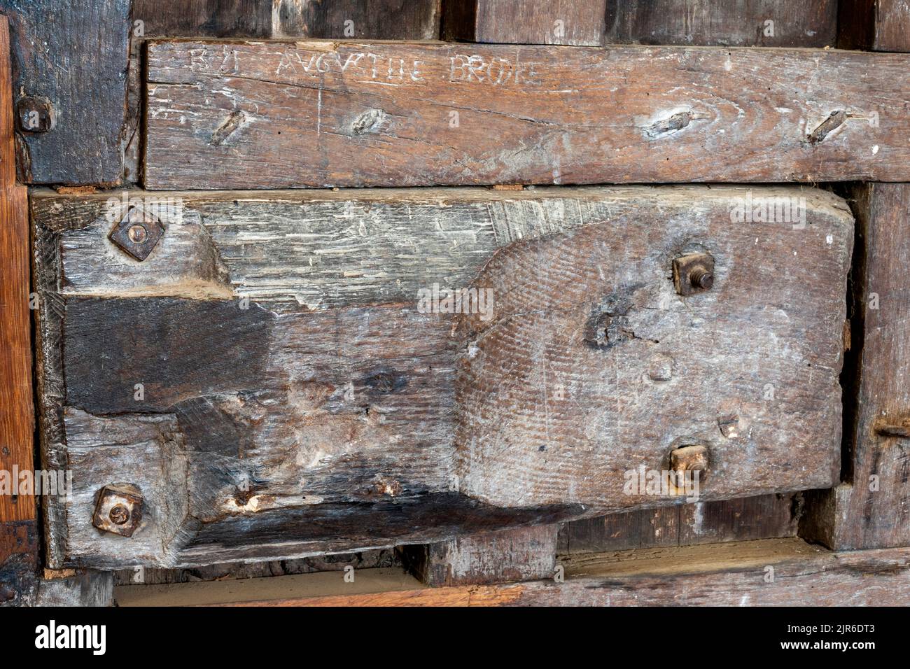 Large wooden church door lock with metal fittings and antique graffiti ...