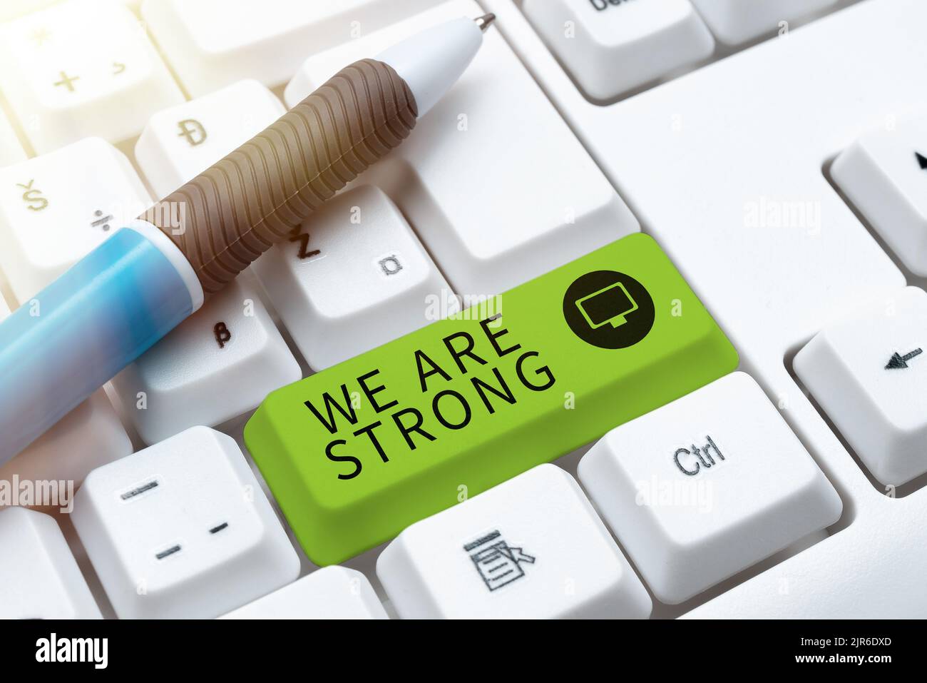 Hand writing sign We Are Strong, Word Written on Have great strength ...