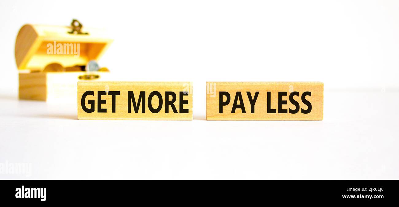 Get more pay less symbol. Concept words Get more pay less on wooden ...