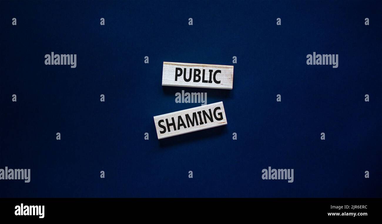 Public shaming symbol. Concept words Public shaming on wooden blocks on ...