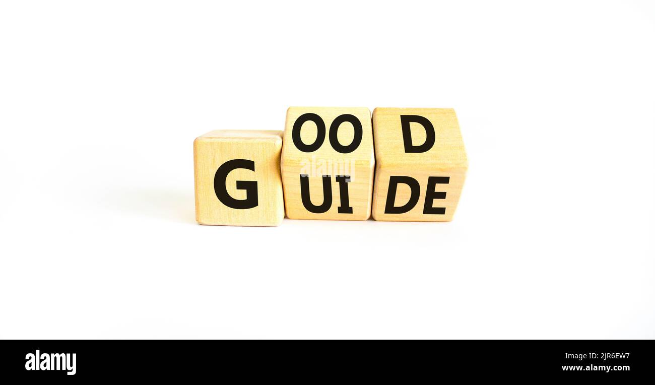 Good guide symbol. Concept words Good guide on wooden cubes. Beautiful ...