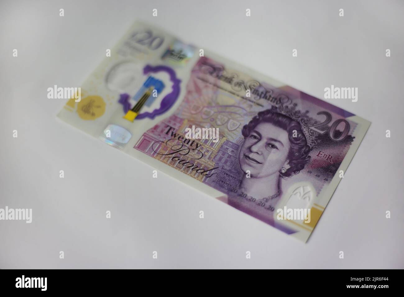 Lying banknote of 20 British pounds on a gray background Stock Photo ...