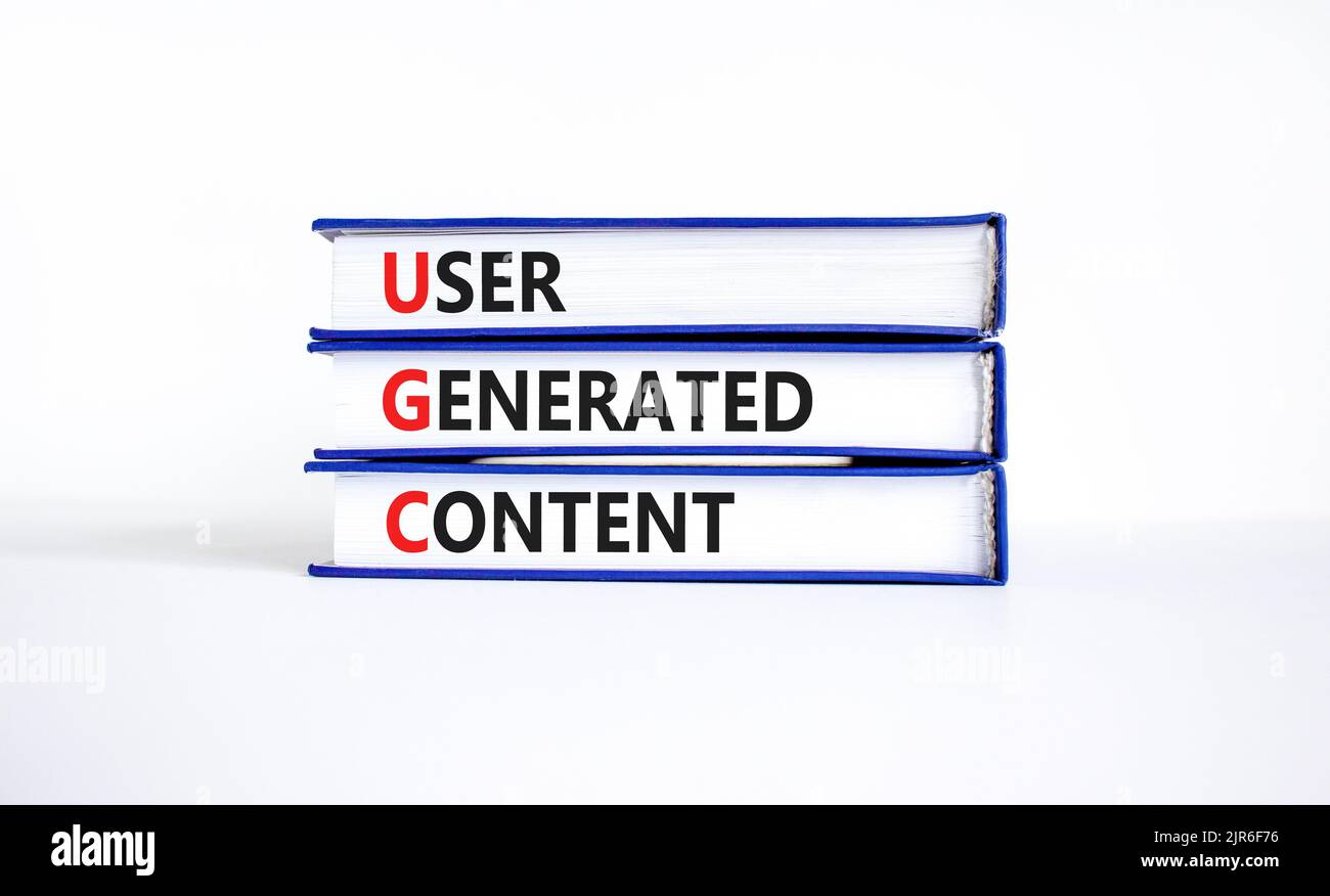UGC user generated content symbol. Concept words UGC user generated content on books on a ...