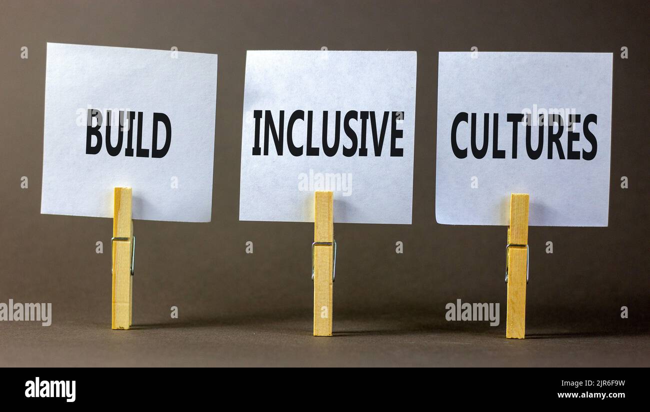 Build inclusive cultures and support symbol. Concept words Build ...