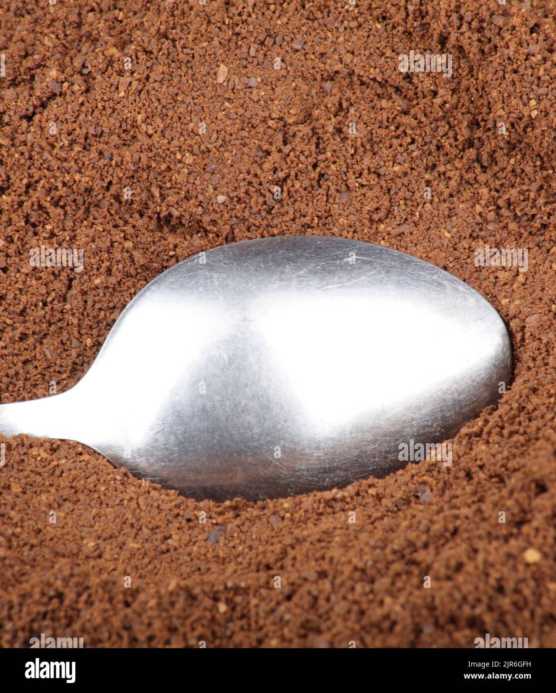 milled coffee and one teaspoon Stock Photo - Alamy