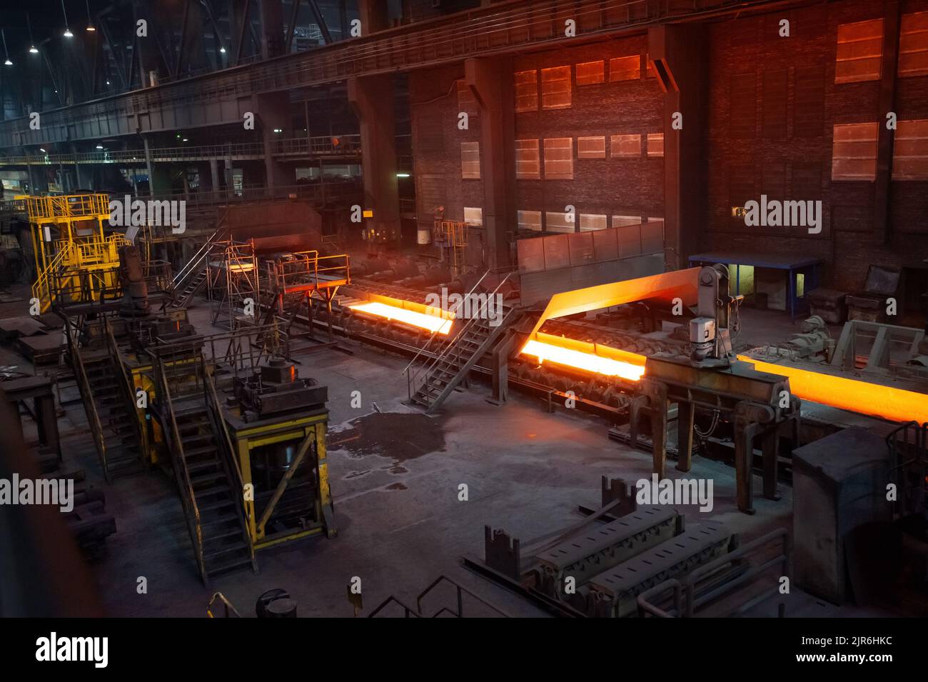 Metallurgical factory in Germany, hot rolled metal conveyor, sheet steel production Stock Photo ...