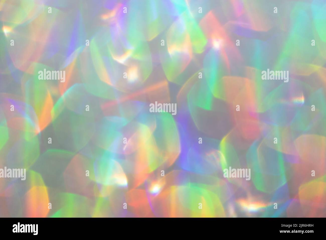 Abstract defocused holographic background with shining glitter.Good as ...