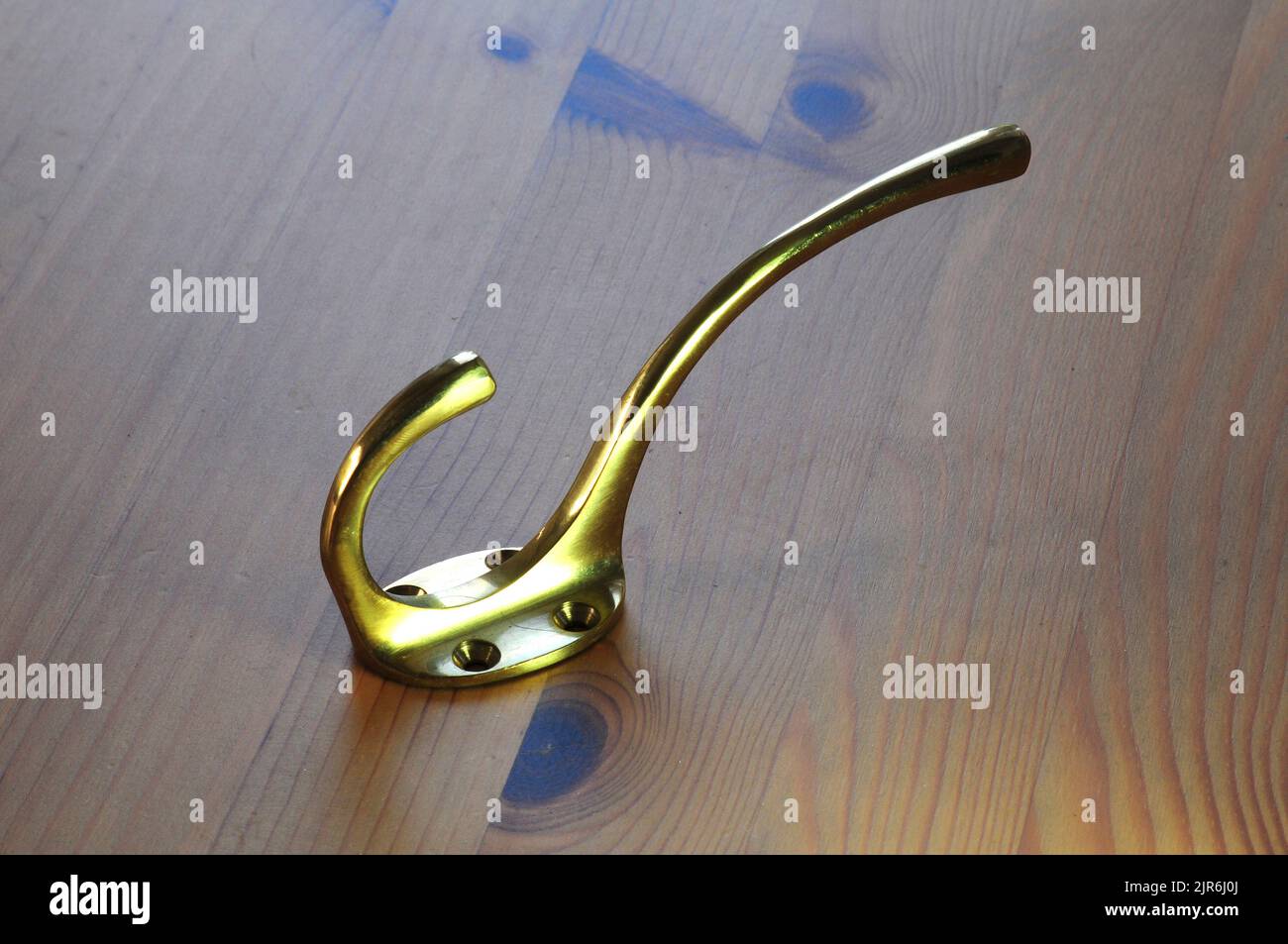 Double brass coat hook Stock Photo - Alamy