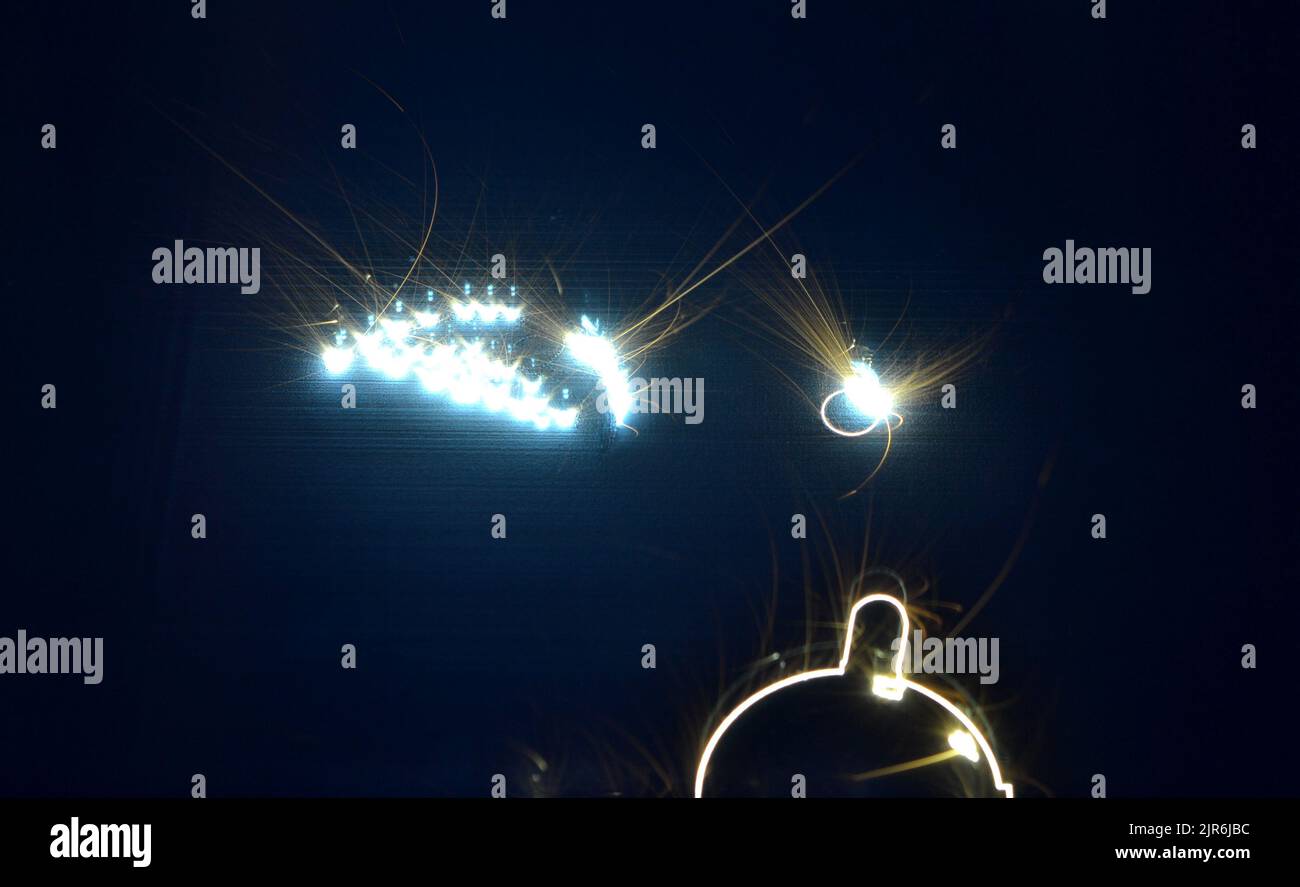 Metal 3D printer printing three-dimensional object from metal powder in ...
