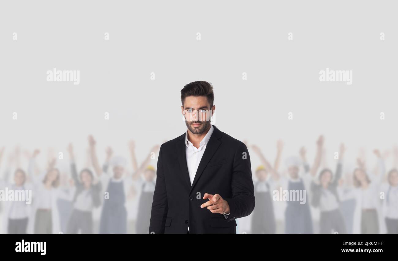 Businessman HR pointing at you in front of crowd of different ...