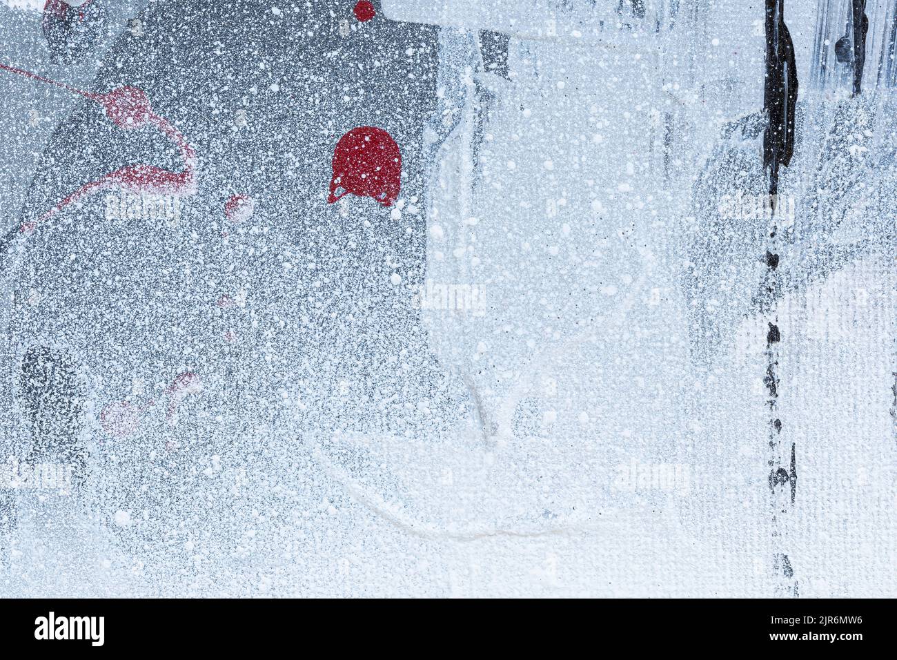 Macro close-up of an abstract white, gray, black, and red acrylic and ...