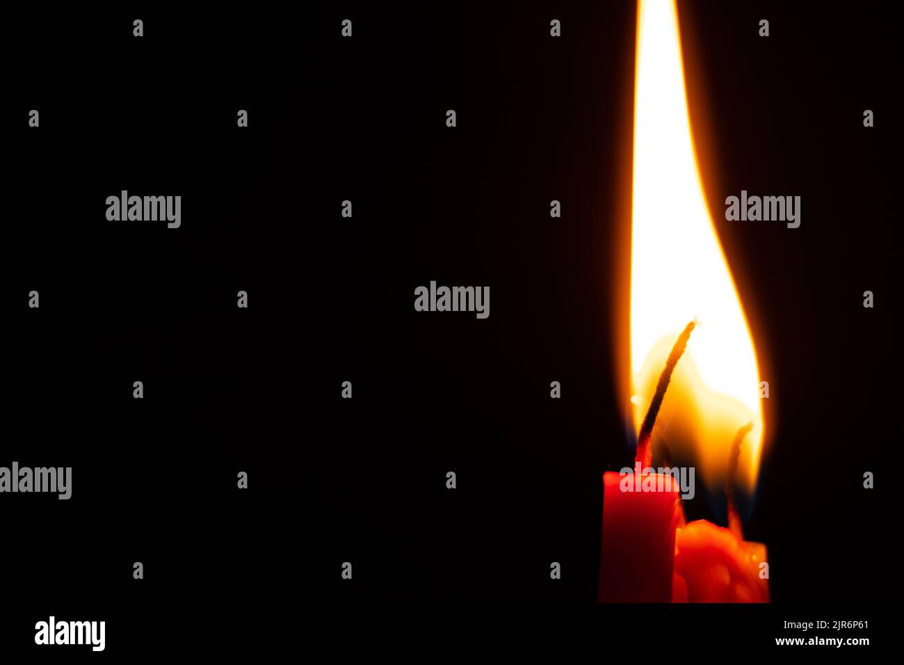candle fire in the dark, burning candle flame, fire Stock Photo - Alamy