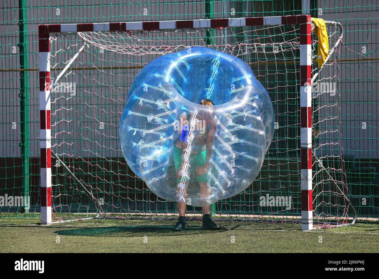 football ball game in inflatable transparent spheres. sports and ...
