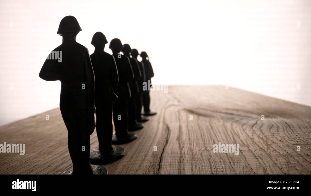 Toy tin soldiers in uniform. Tin soldiers of war. Miniature armed ...