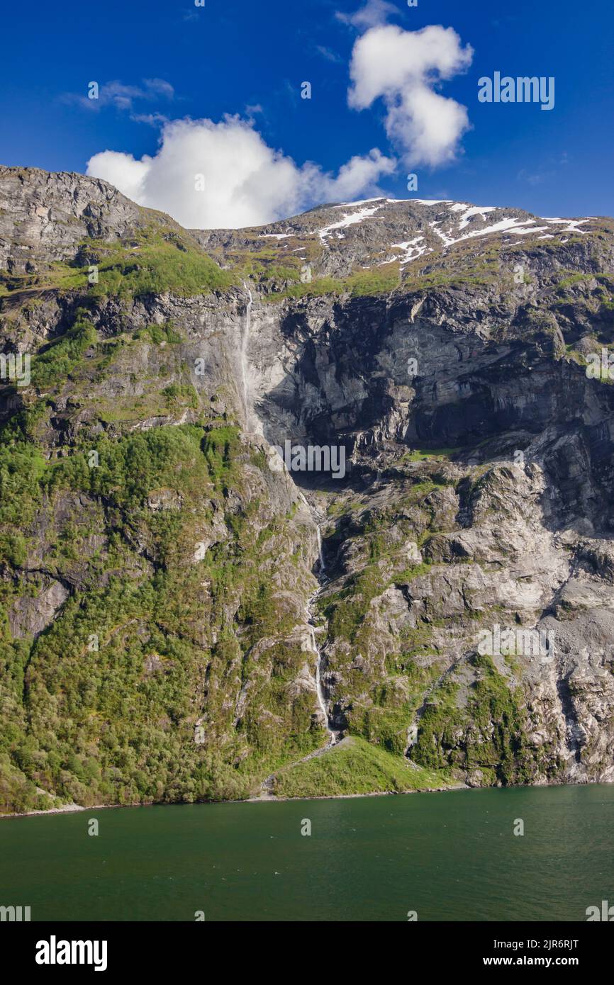 Beautiful and imposing Norwegian fjord in spring with its waterfalls ...