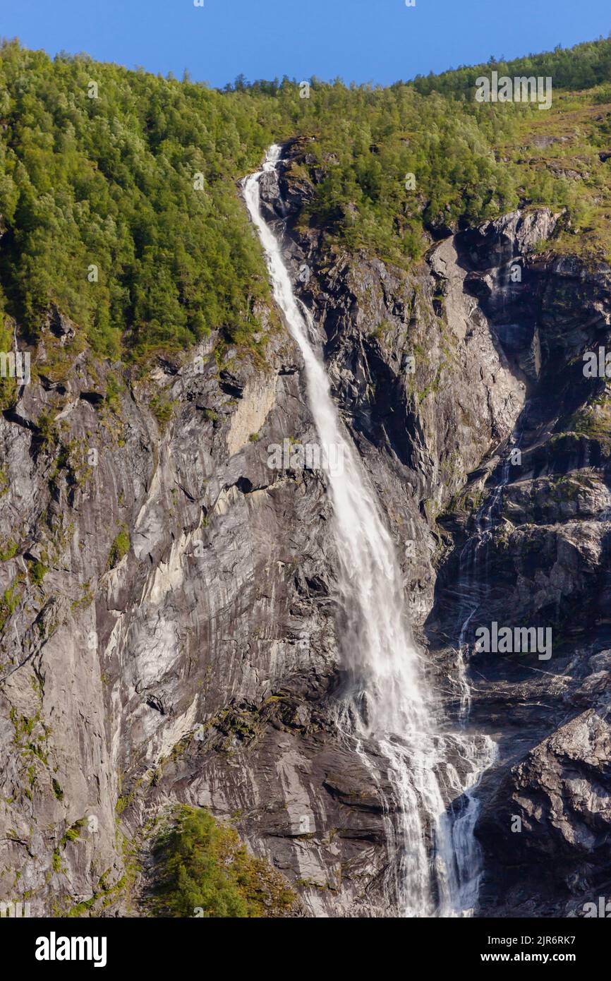 Beautiful and imposing Norwegian fjord in spring with its waterfalls ...