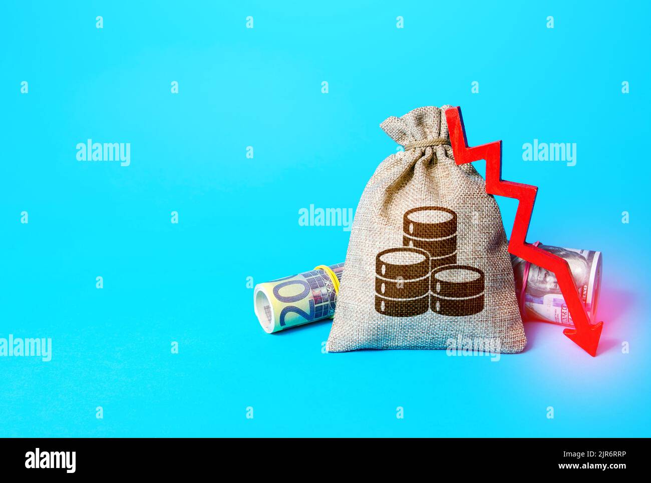 Money bag and red arrow down. Falling economy. Decrease in interest ...