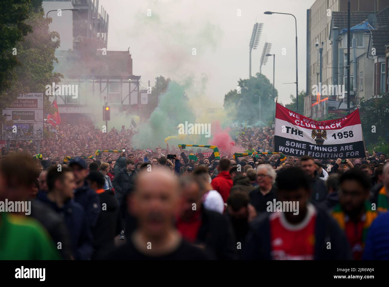 Fans take part in an organised protest march outside the ground against ...