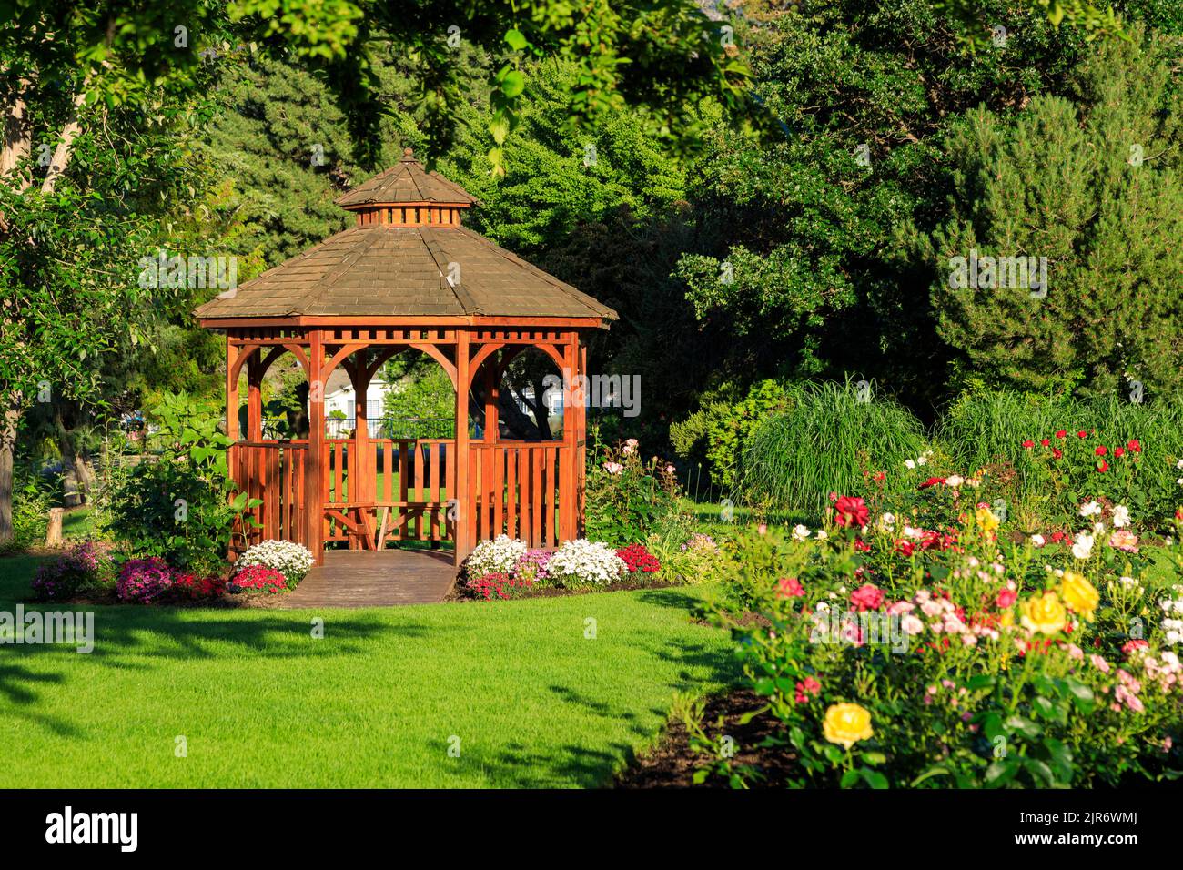 Cedar wooden gazebo at the rose garden in the city park of Penticton ...