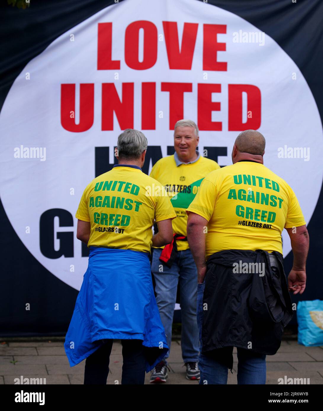 Fans wearing anti-Glazer t-shirts during an organised protest march ...