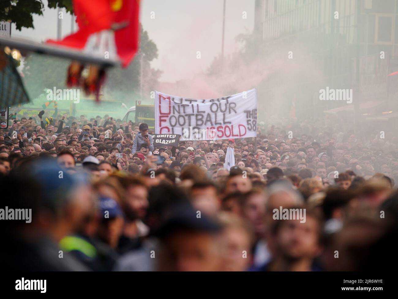 Fans take part in an organised protest march outside the ground against ...