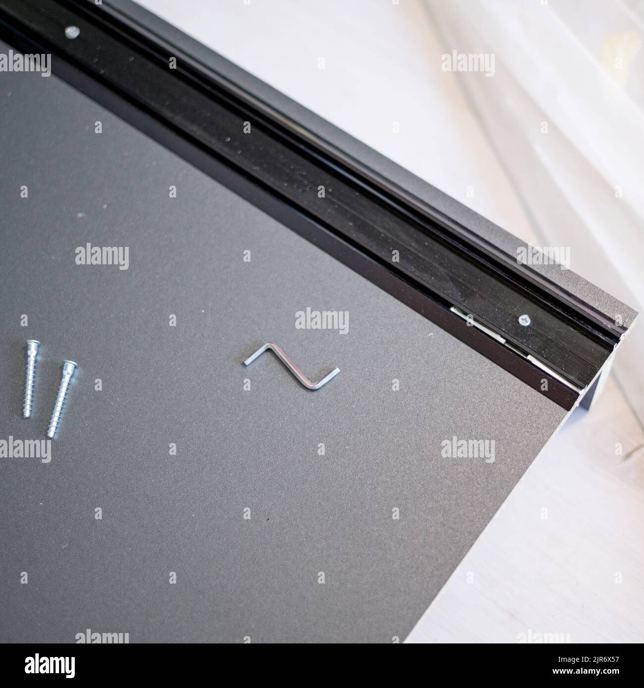 Fastening to a case of sliding accessories for doors of a sliding ...