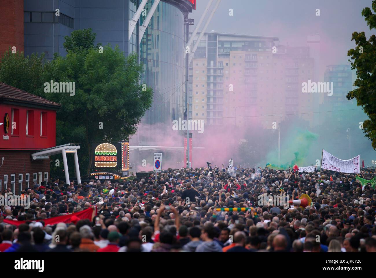Fans take part in an organised protest march outside the ground against ...